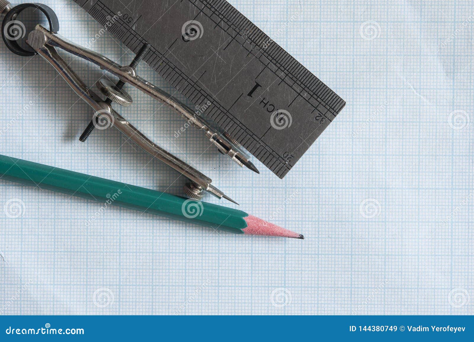 Set of Drawing Instrument and Rulers on Graph Paper Stock Image - Image ...