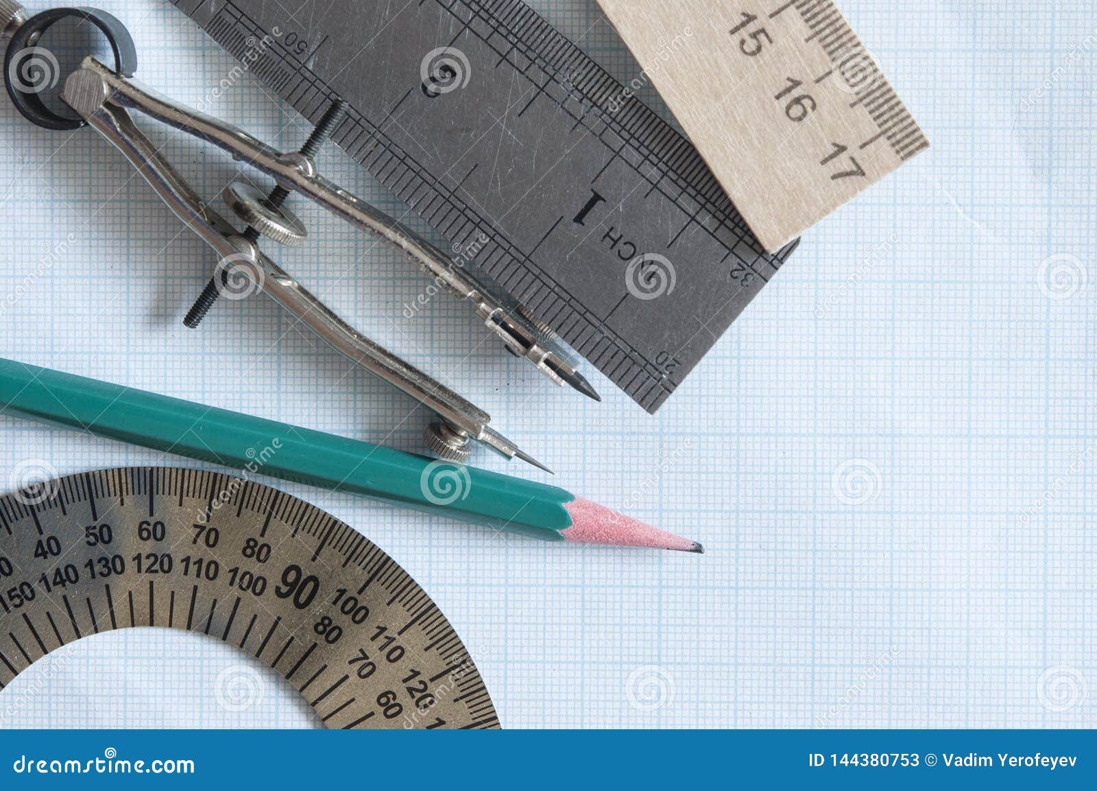 Set of Drawing Instrument and Rulers on Graph Paper Stock Image - Image ...