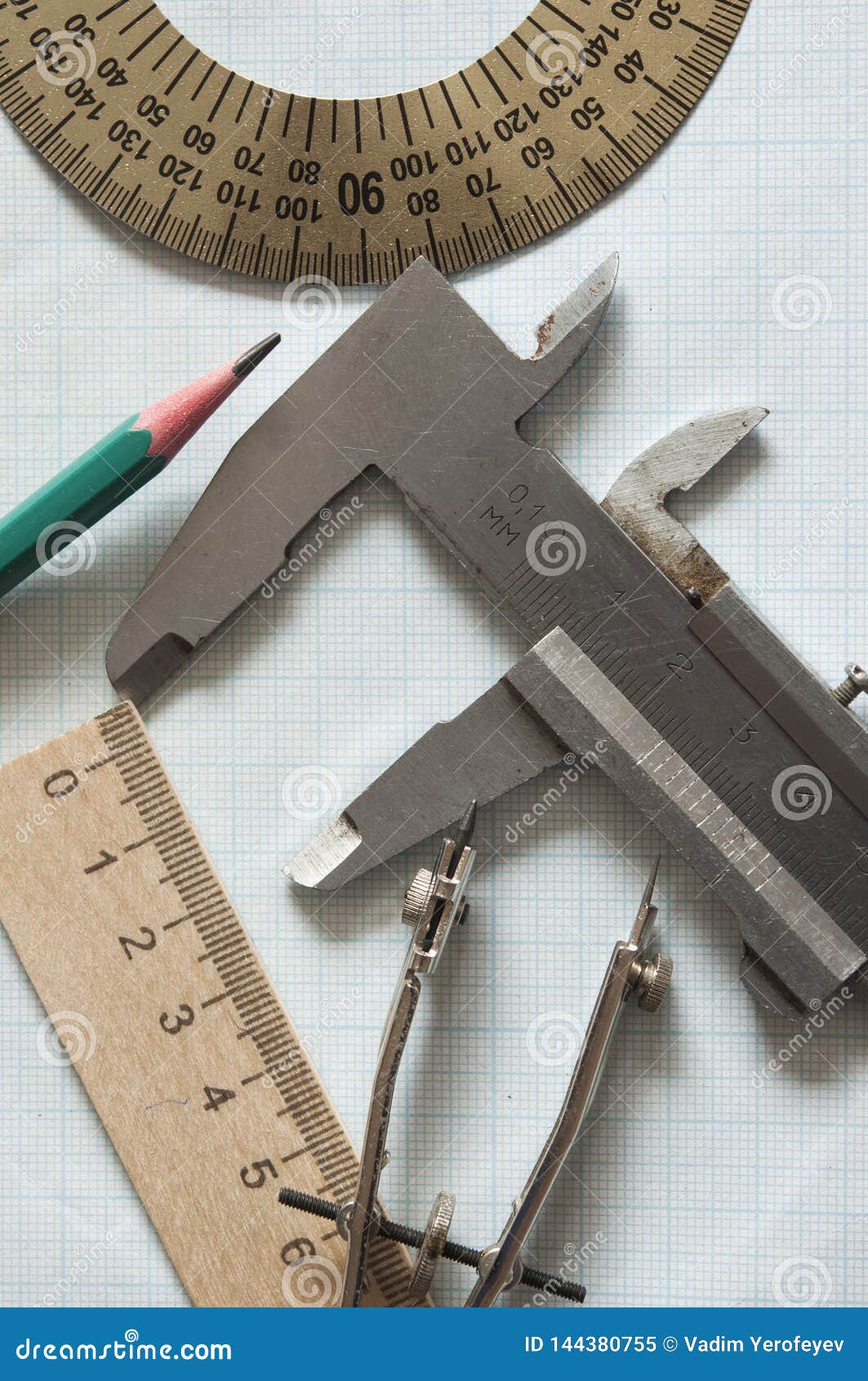 Set of Drawing Instrument and Rulers on Graph Paper Stock Image - Image ...