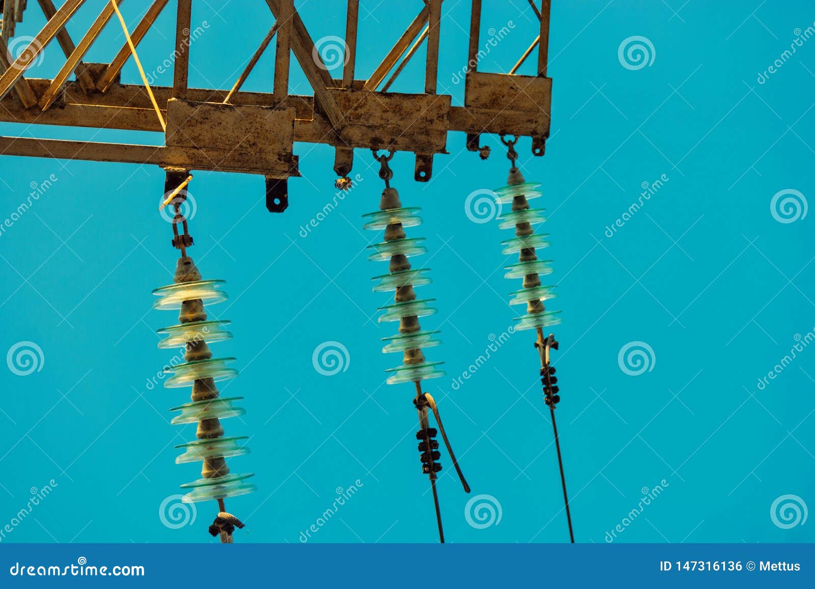 Set of Electrical Insulator with Wires Mounted on Rusty Power Tower in ...