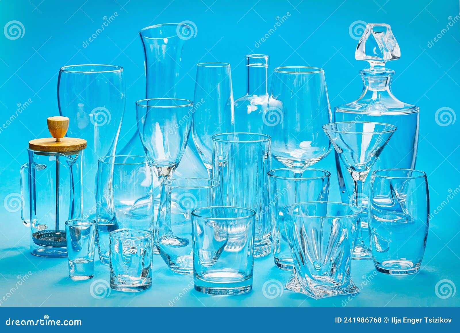 Set of Empty Different Glasses on a Blue Background. Alcoholic Drinks ...