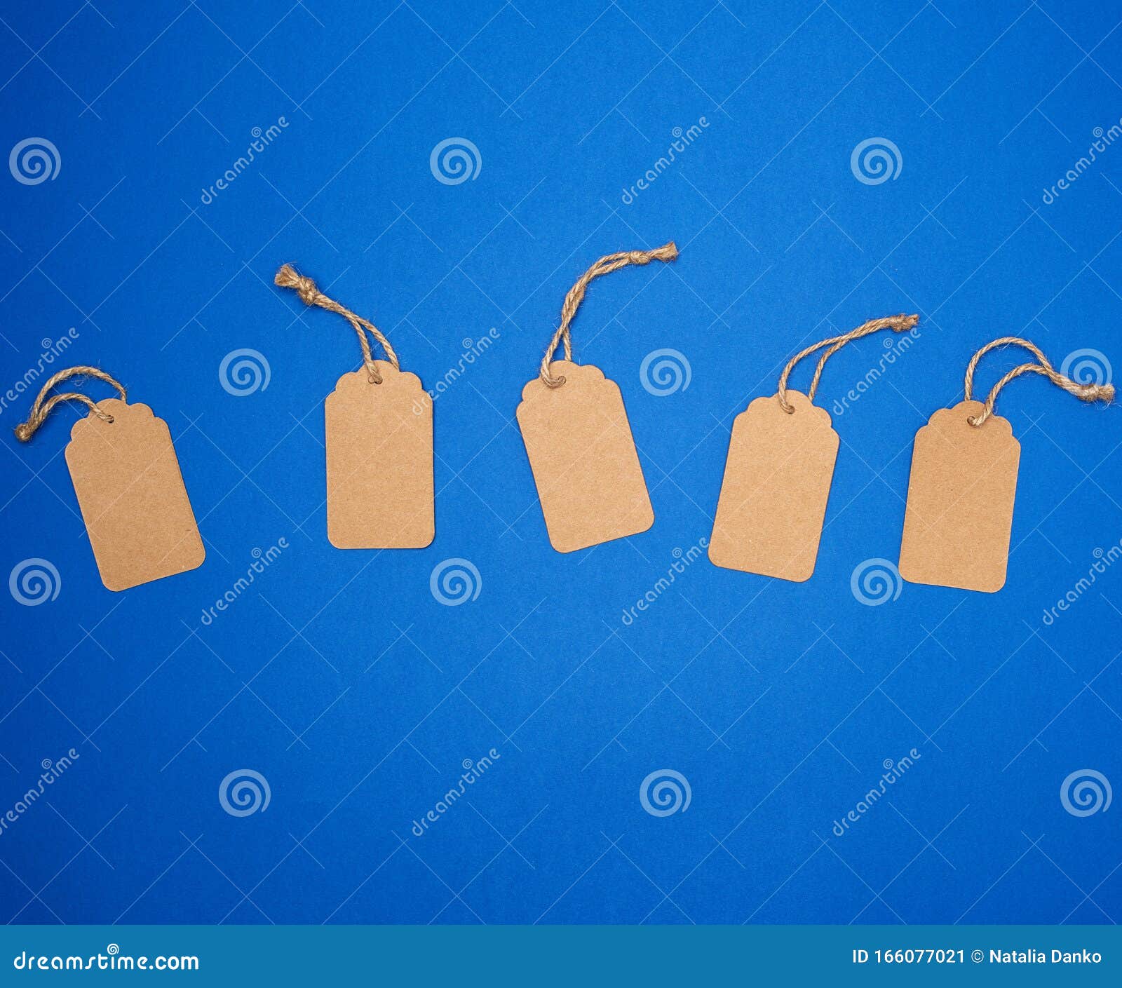 Set of Empty Paper Brown Rectangular Tags on a Rope, Price Tags Stock ...