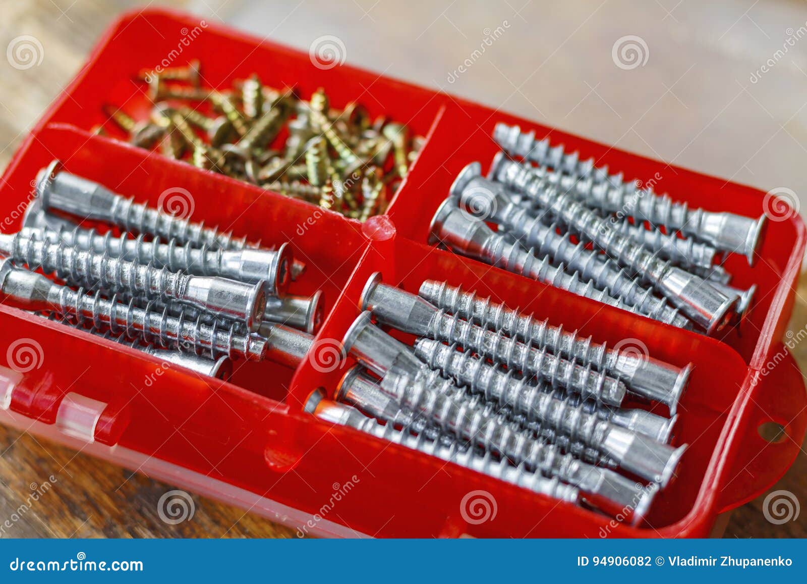 Set of Fasteners for Assembling Furniture in a Red Plastic Storage Box ...