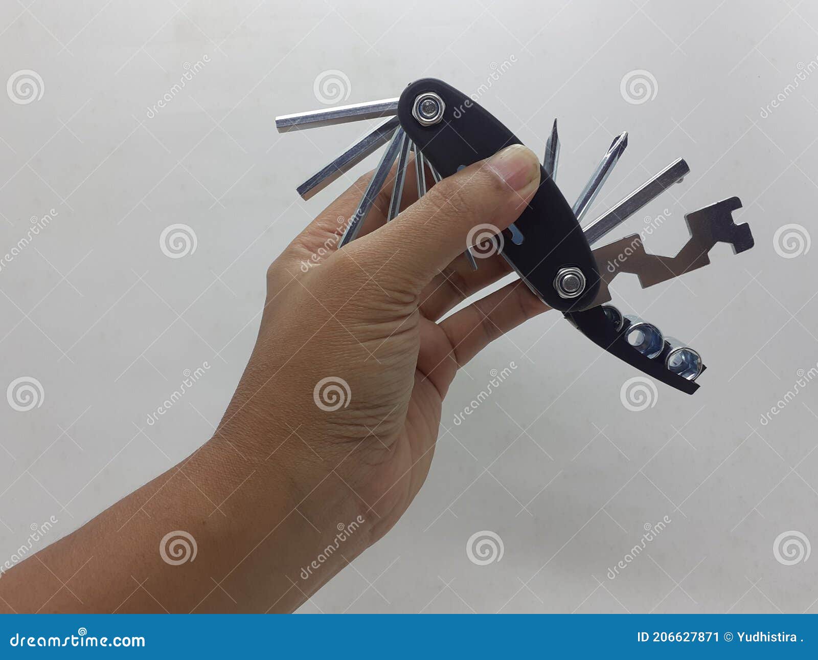 A Set of Foldable Wrench and Screwdriver on White Isolation Background ...