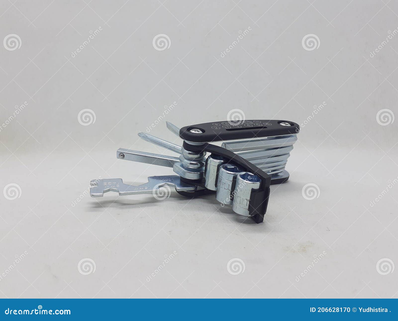 A Set of Foldable Wrench and Screwdriver on White Isolation Background ...