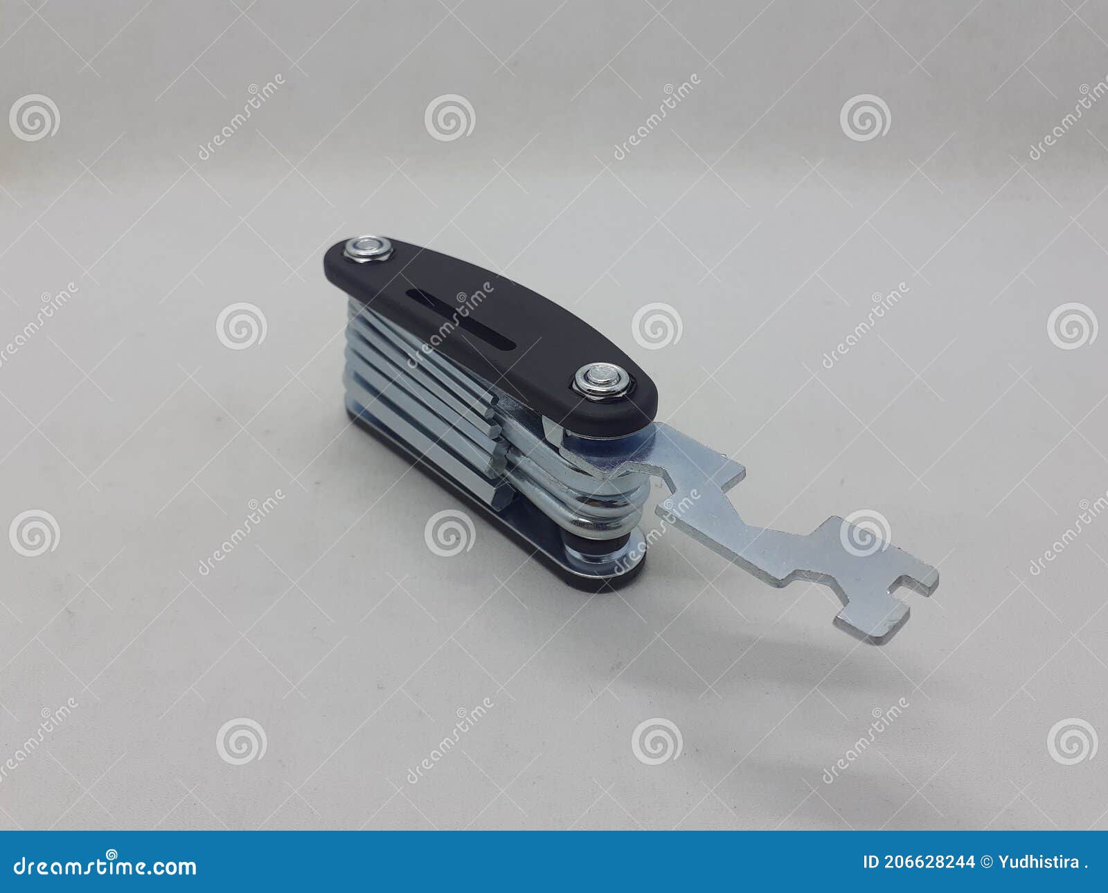 A Set of Foldable Wrench and Screwdriver on White Isolation Background ...