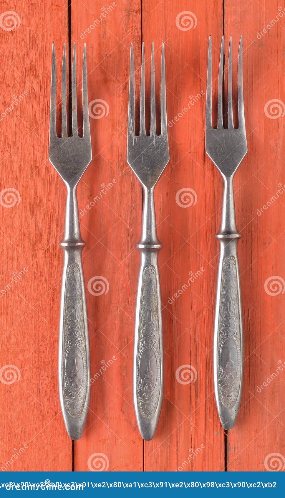 A Set of Forks on an Orange Wooden Surface. Top View Stock Image ...