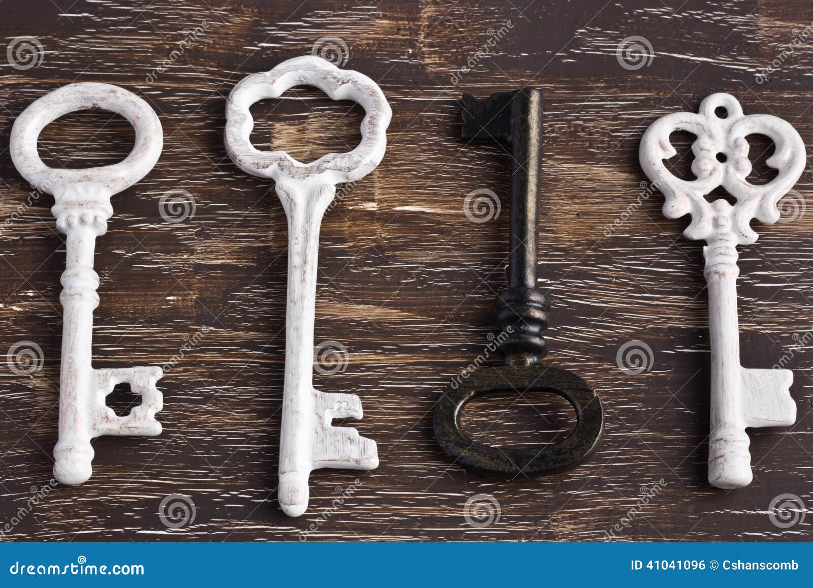 Set of Four Antique Keys, One Being Different and Upside Down Stock ...