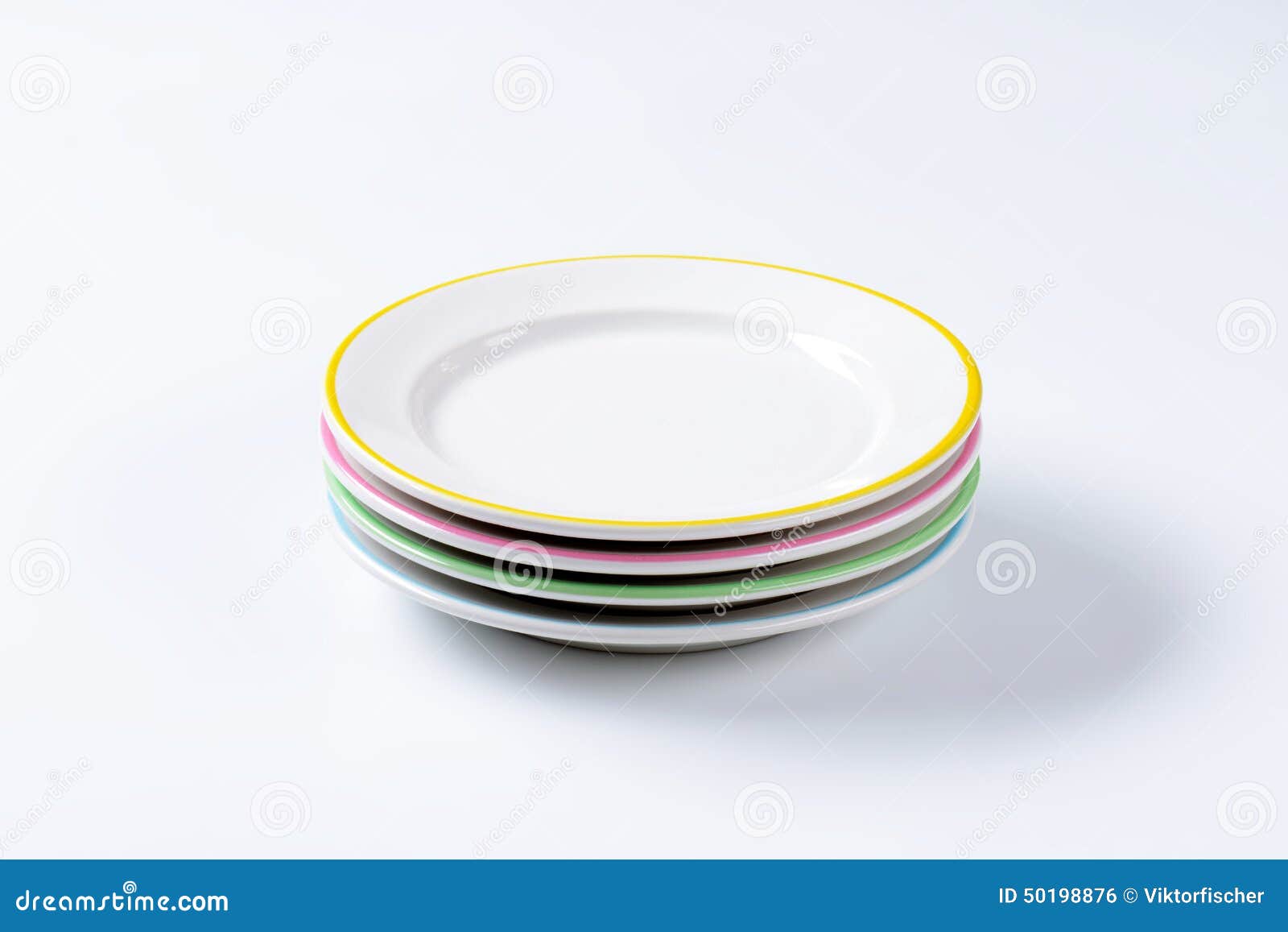 Set of four dinner plates stock photo. Image of studio - 50198876