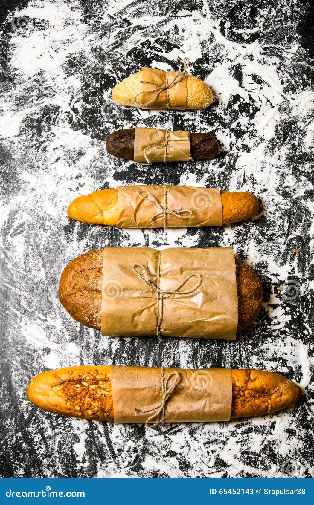 Set of Fresh Bread Wrapped in Paper. Stock Image - Image of rustic ...