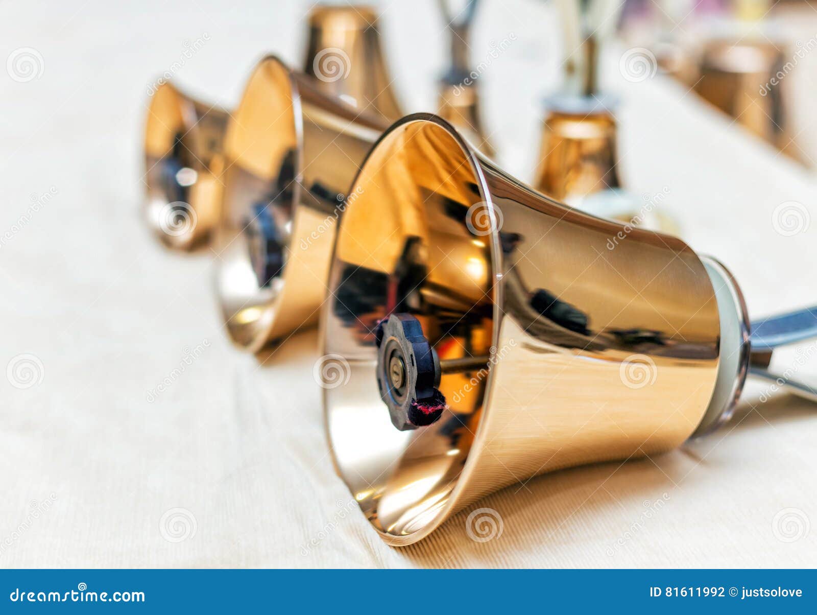 Set of Gold Handbells on Table during Concert Stock Photo - Image of ...