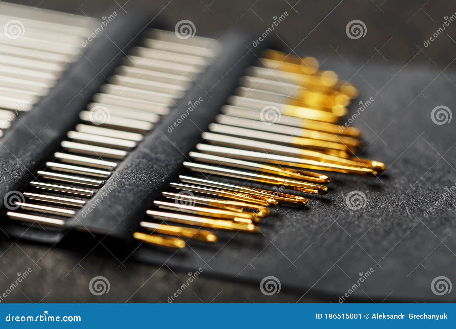 Set of Gold Needles on a Black Background in a Row Stock Image - Image ...