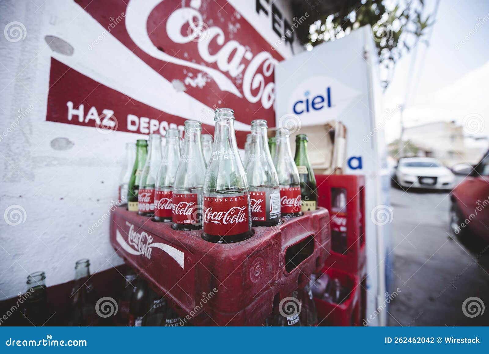 Set of Half-empty Coca-Cola Glass Bottles in a Red Coca-Cola Box ... Set of Half-empty Coca-Cola Glass Bottles in a Red Coca-Cola Box ...