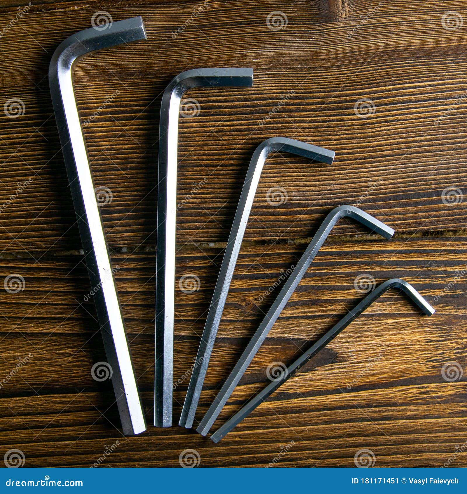 Set of Hexagonal Keys on a Wooden Table. Top View Stock Image - Image ...