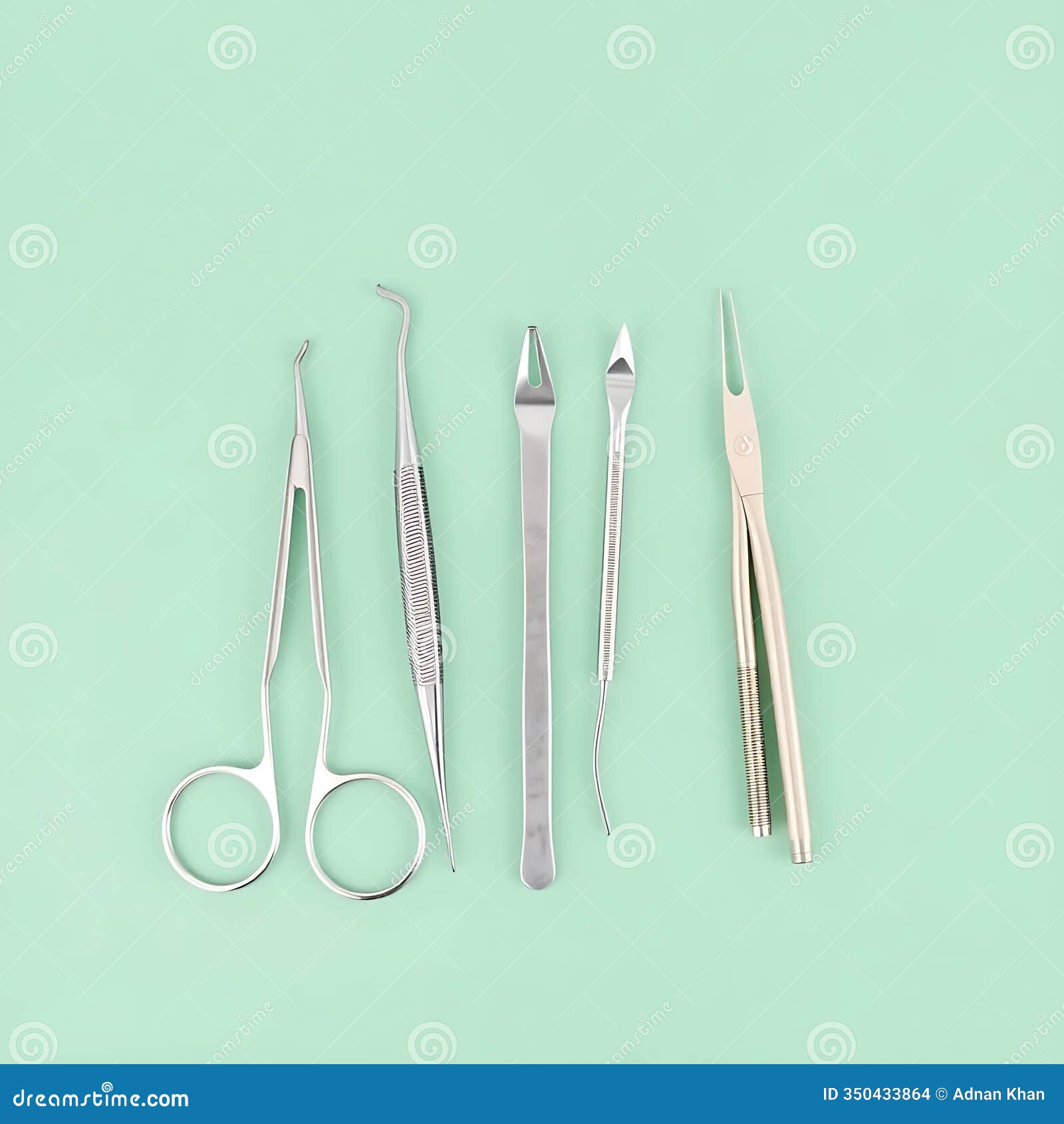 A Set of Instruments for Minimally Invasive Surgery on a Pastel Green ...