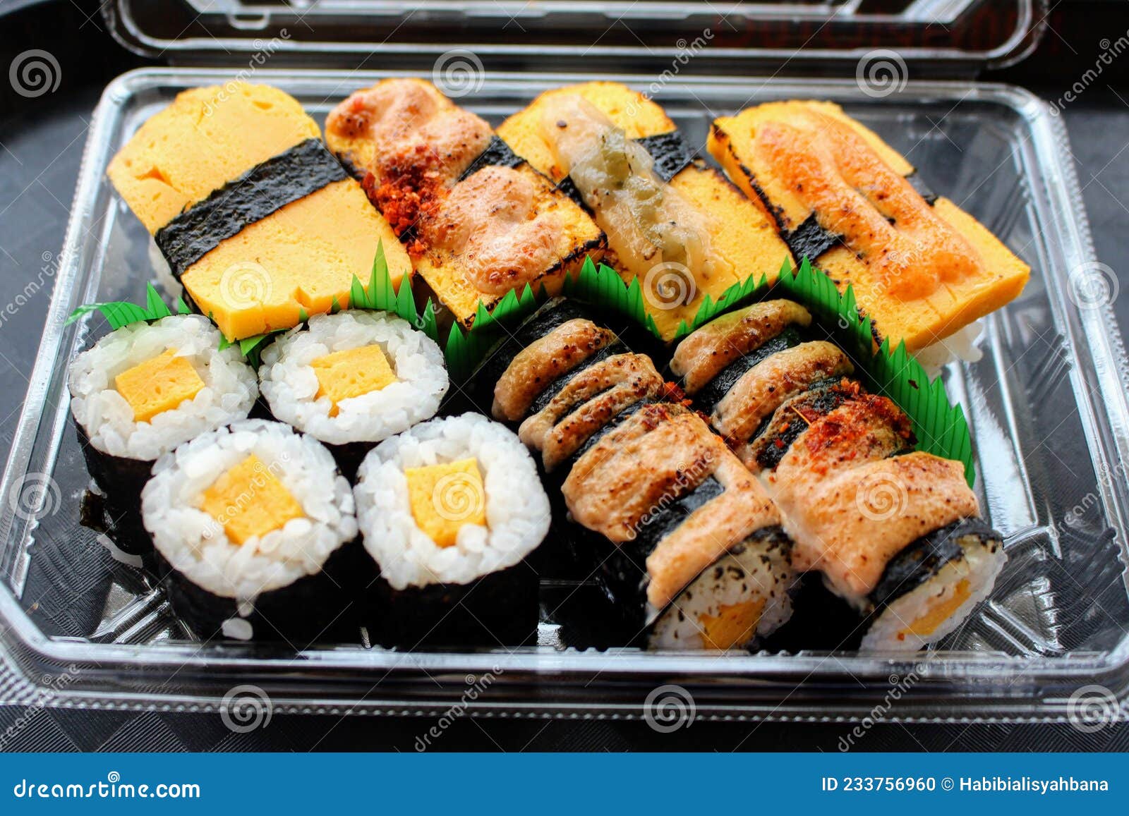 A Set of Japanese Sushi in a Plastic Container Stock Photo - Image of ...