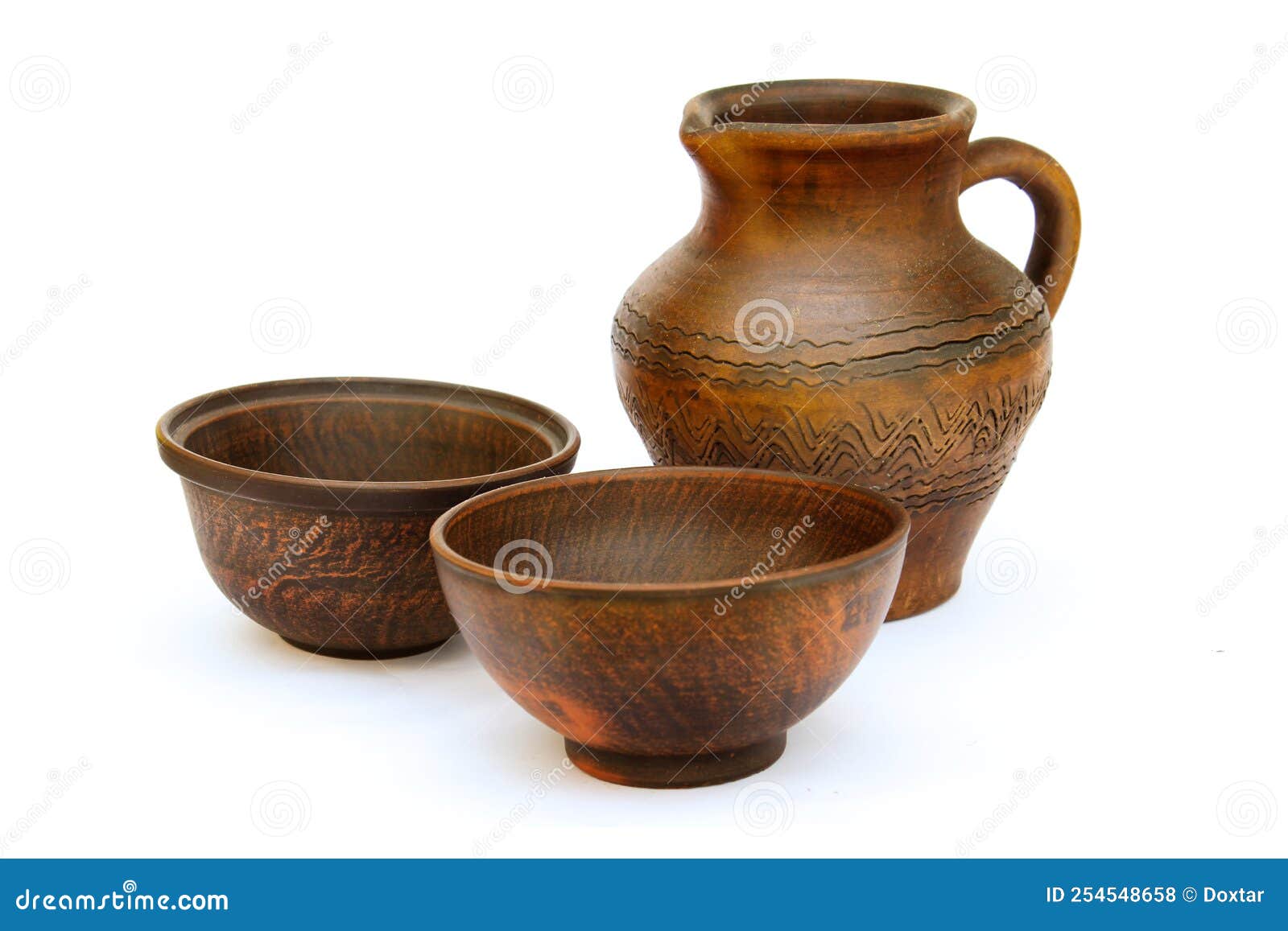 Set of Kitchen Utensils Jug and Several Earthenware Plates Stock Photo ...