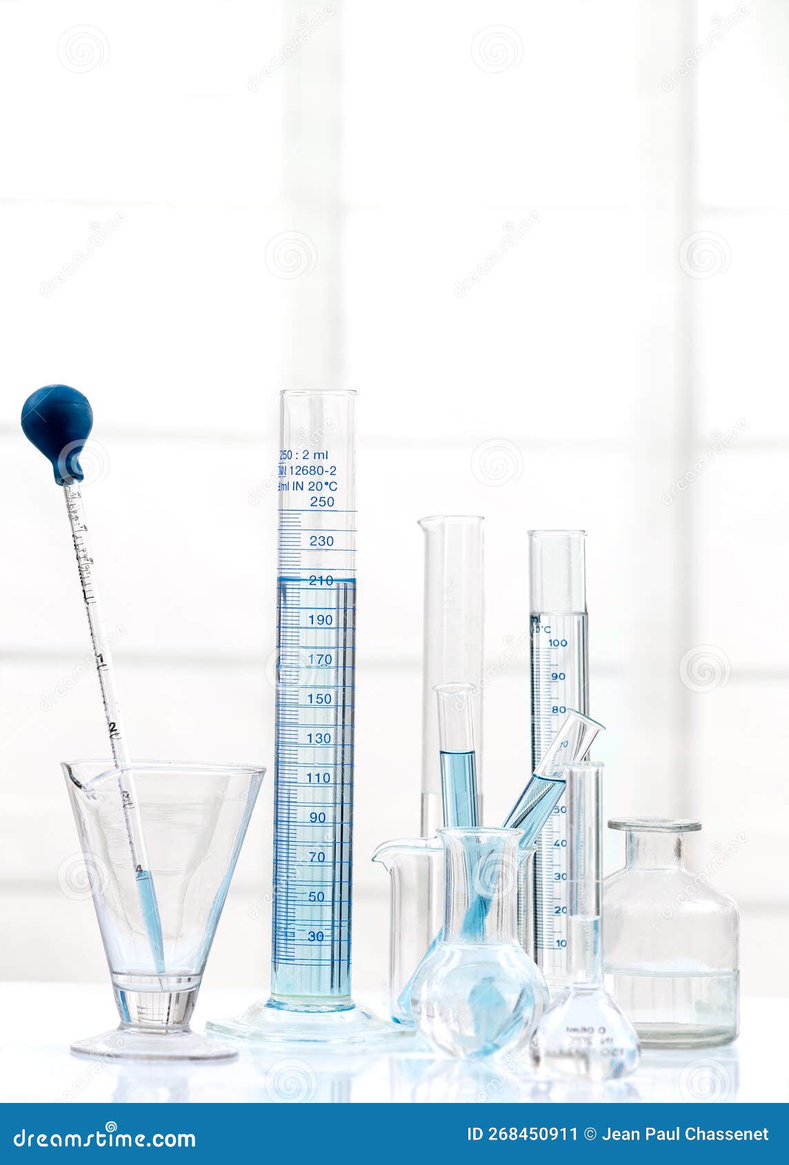 Set of Laboratory Glassware with Blue Liquid on White Background. Stock ...