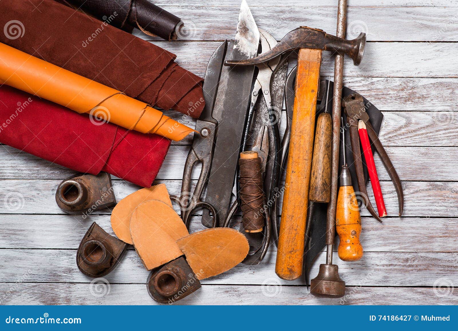 Set of Leather in Rolls, Craft Tools on White Wooden Background ...