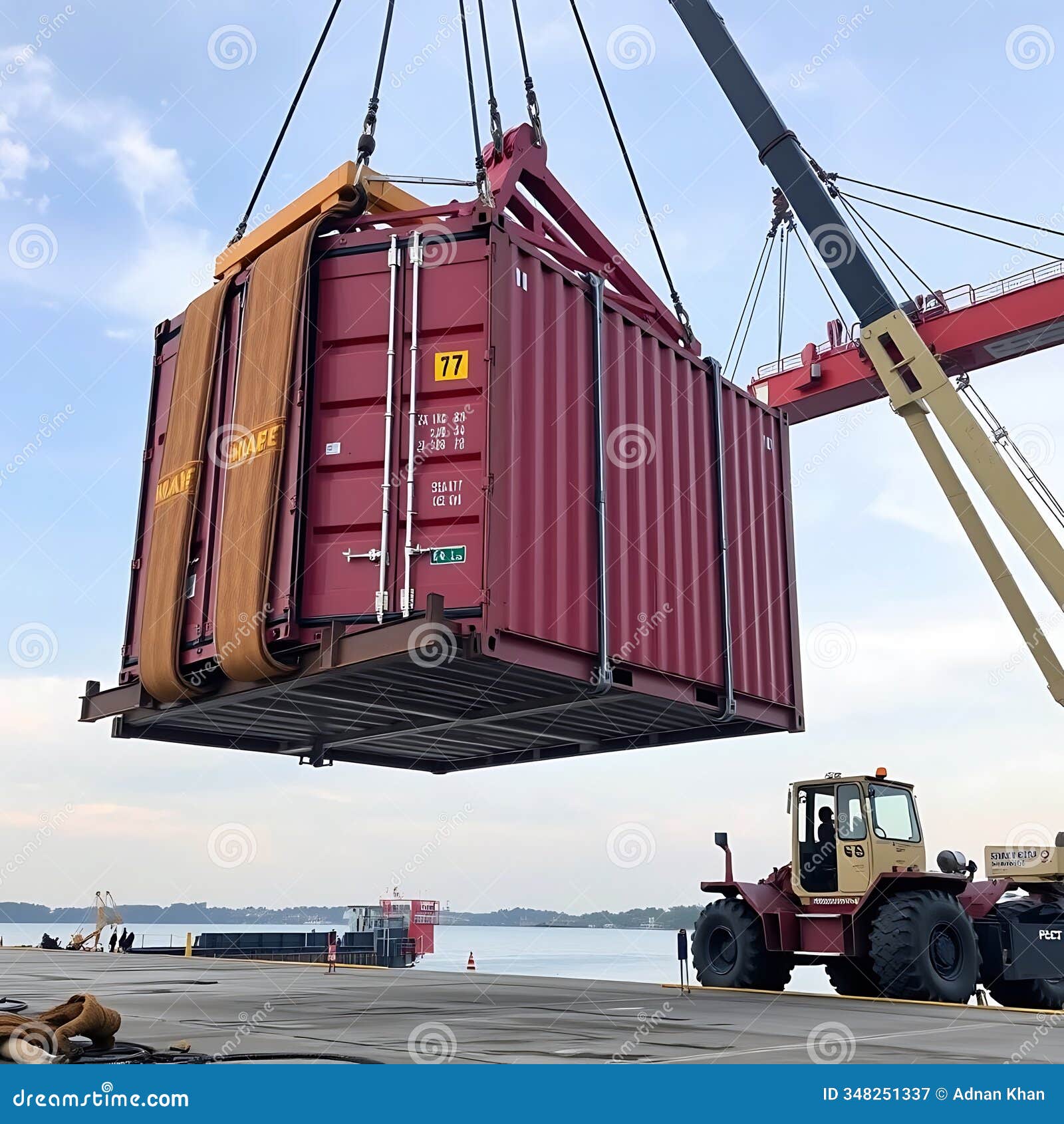 A Set of Lifting Slings Securing a Large Cargo Container on a Dock with ...