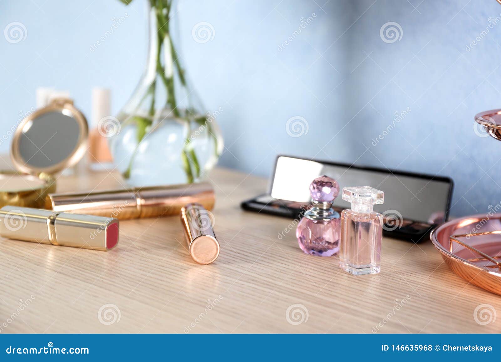Set of Luxury Cosmetics on Dressing Table Stock Photo - Image of blue ...