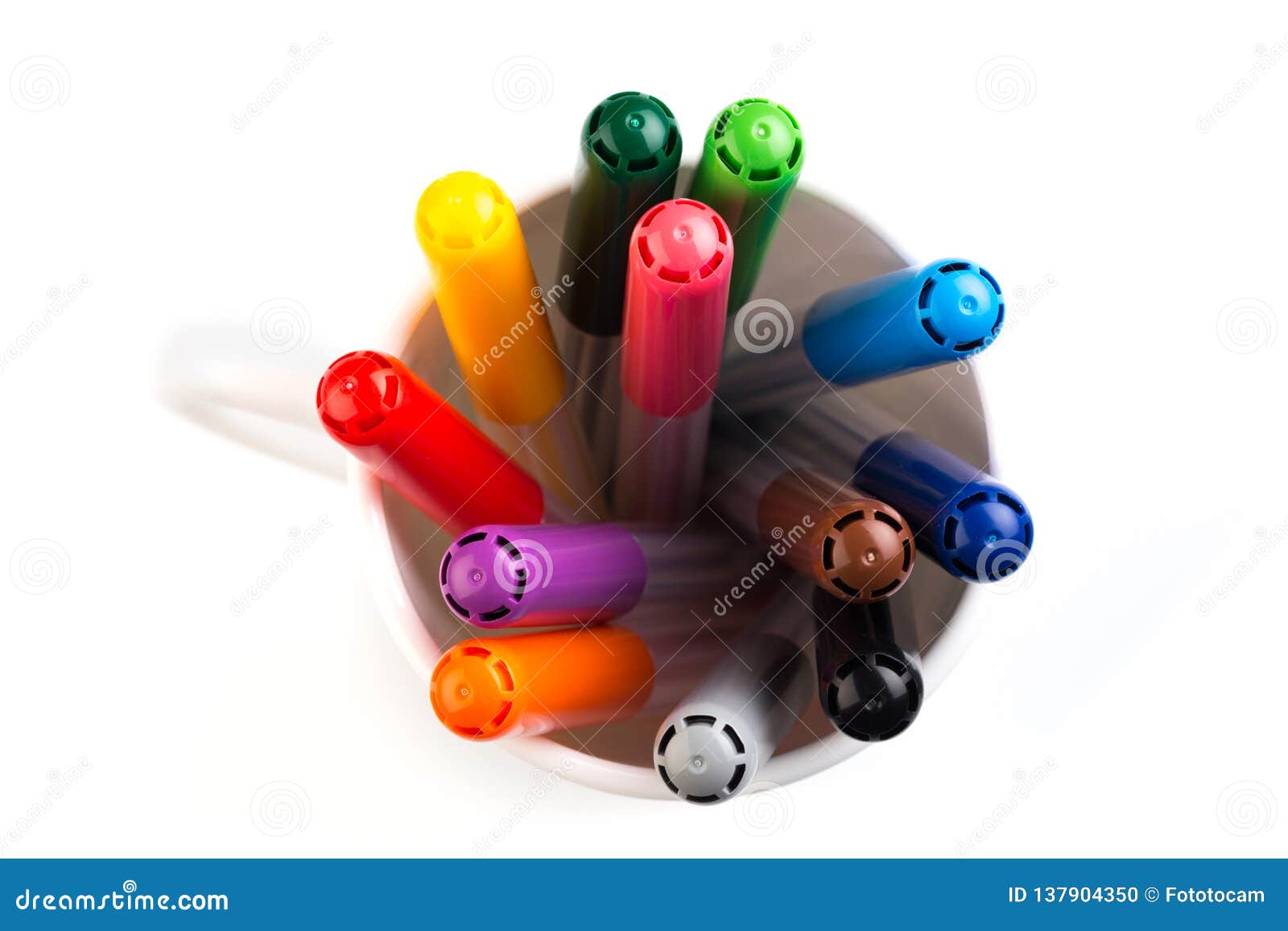 Set of Markers in a Paper Cup and a Piece of Paper on White Background ...