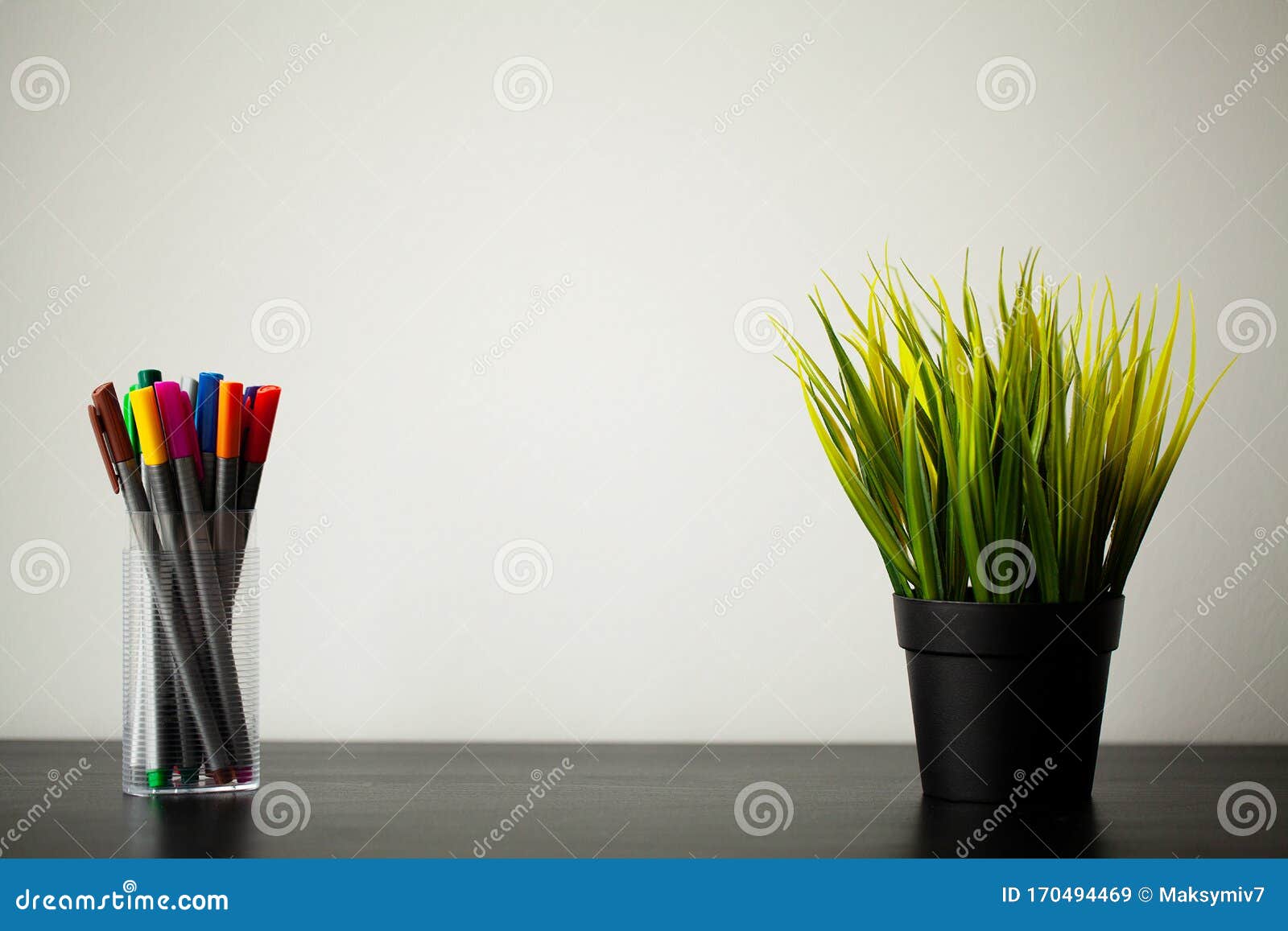 Set of Markers in a Plastic Cup on Wood Table. Stock Image - Image of ...