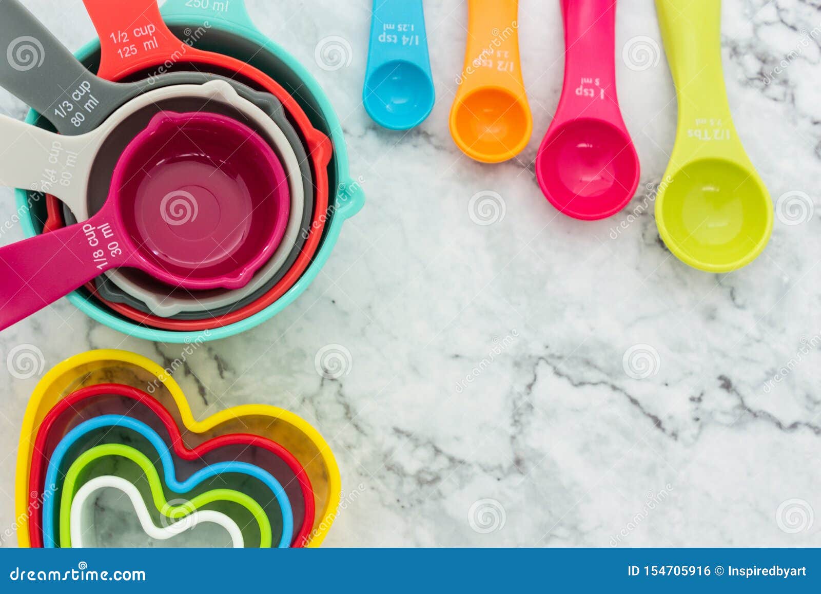 Set of Measuring Cups, Measuring Spoons and Plastic Cookie Cutters Use ...