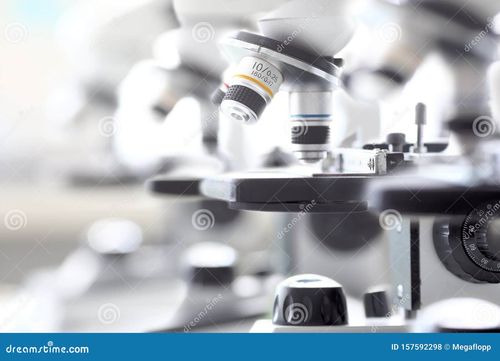Set of Microscopes Standing in Row in School Chemist Classroom Stock ...