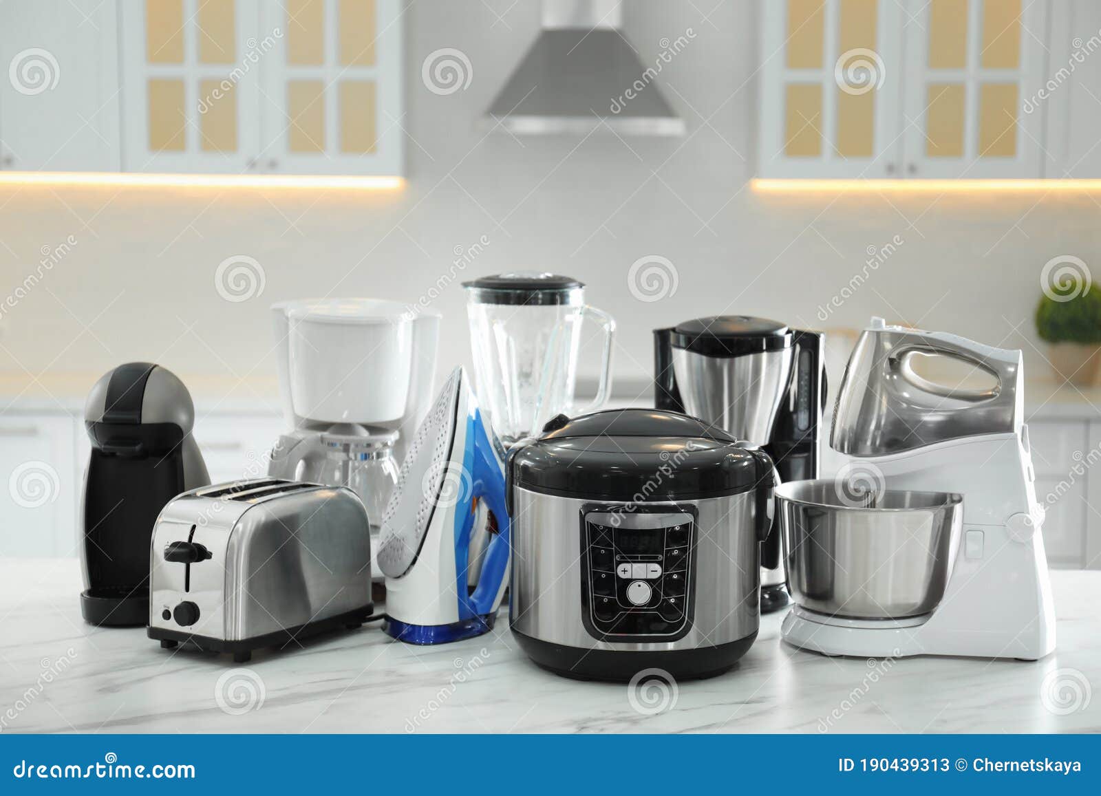 Set of Modern Home Appliances on White Table in Kitchen Stock Image ...