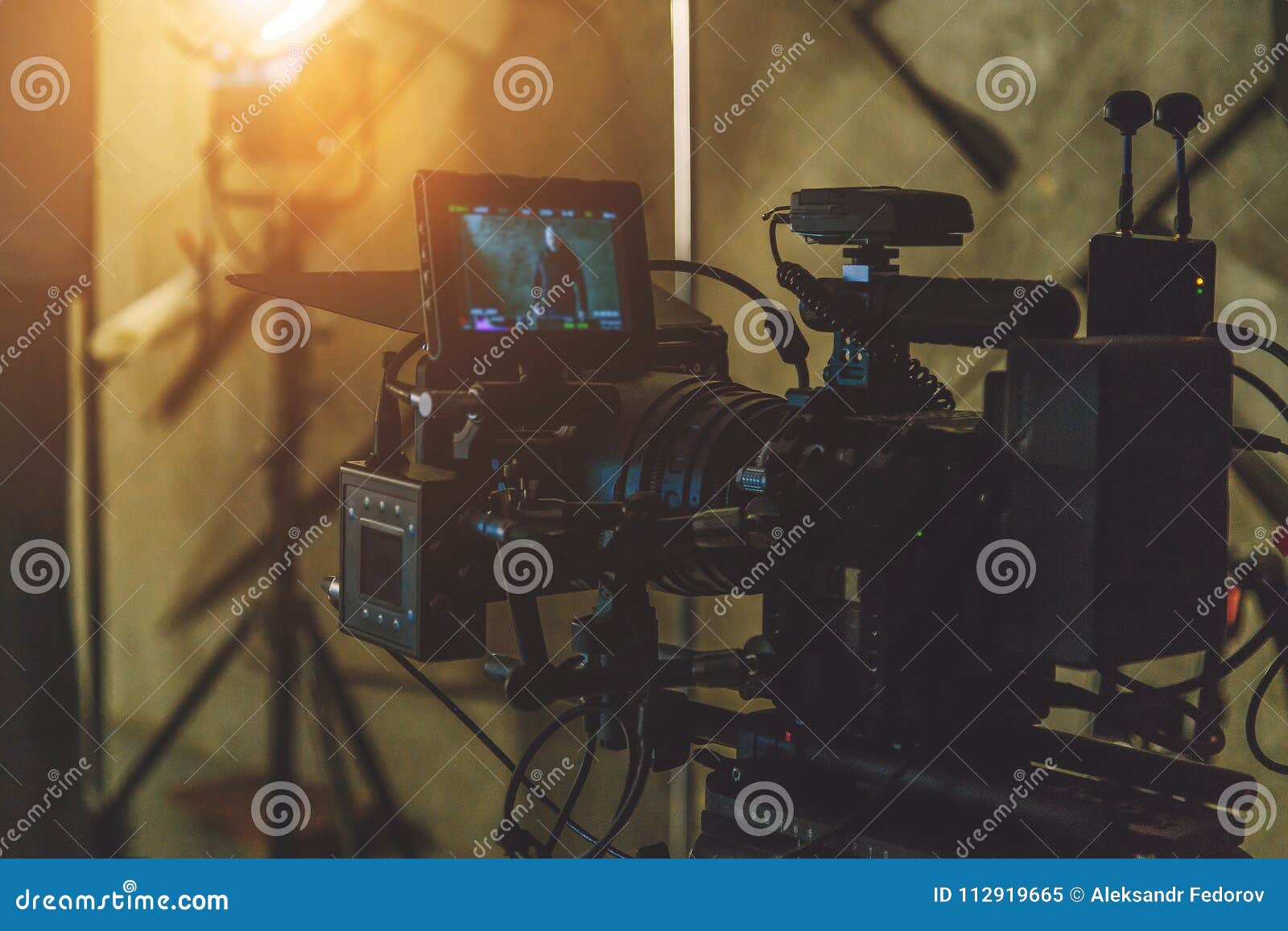 On-set movie camera stock image. Image of people, making - 112919665