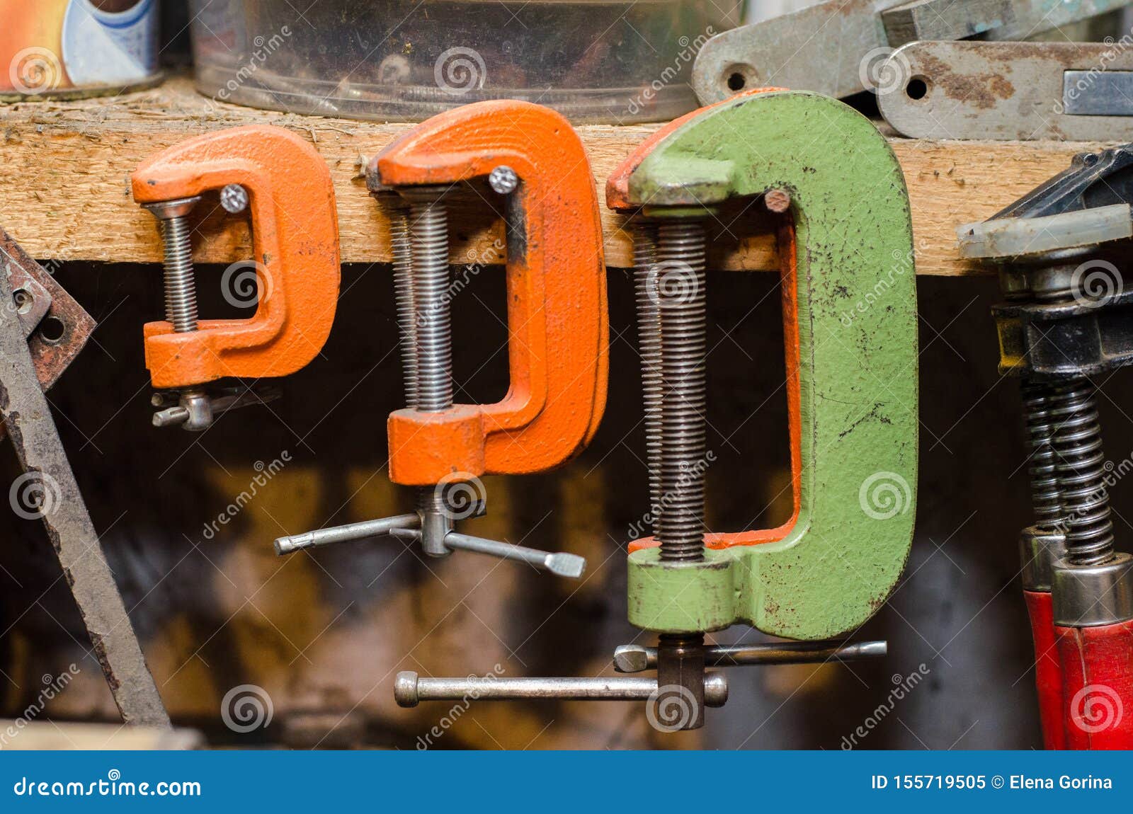 A Set of Multi-colored Clamps Hang in the Workplace Stock Image - Image ...