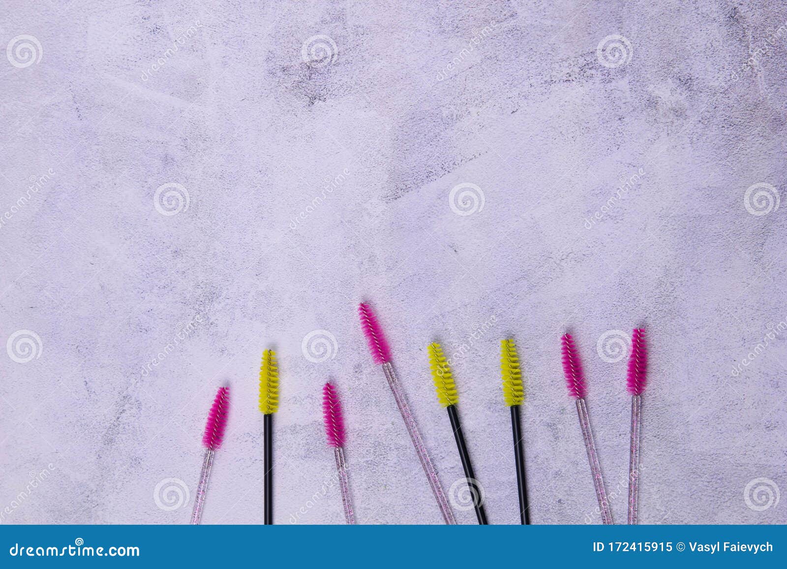 Set of Multi-colored Eyebrow Brushes on a Concrete Background Stock ...