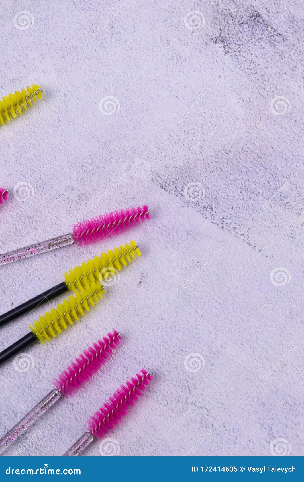 Set of Multi-colored Eyebrow Brushes on a Concrete Background Stock ...