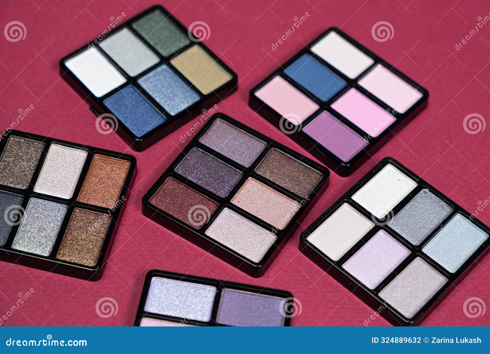 A Set of Multi-colored Eyeshadow on a Pink Background. Eye Makeup Stock ...