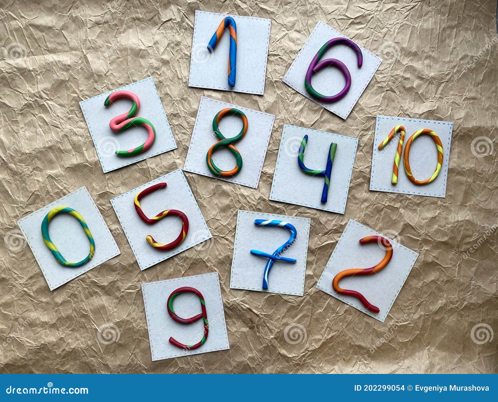 A Set of Multi-colored Numbers Made of Plasticine, Scattered Randomly ...