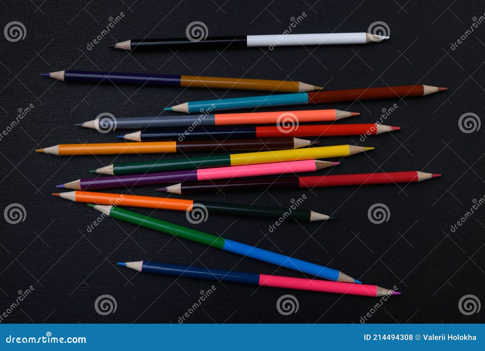 Set of Multi-colored Pencils Scattered on a Black Table Surface Stock ...