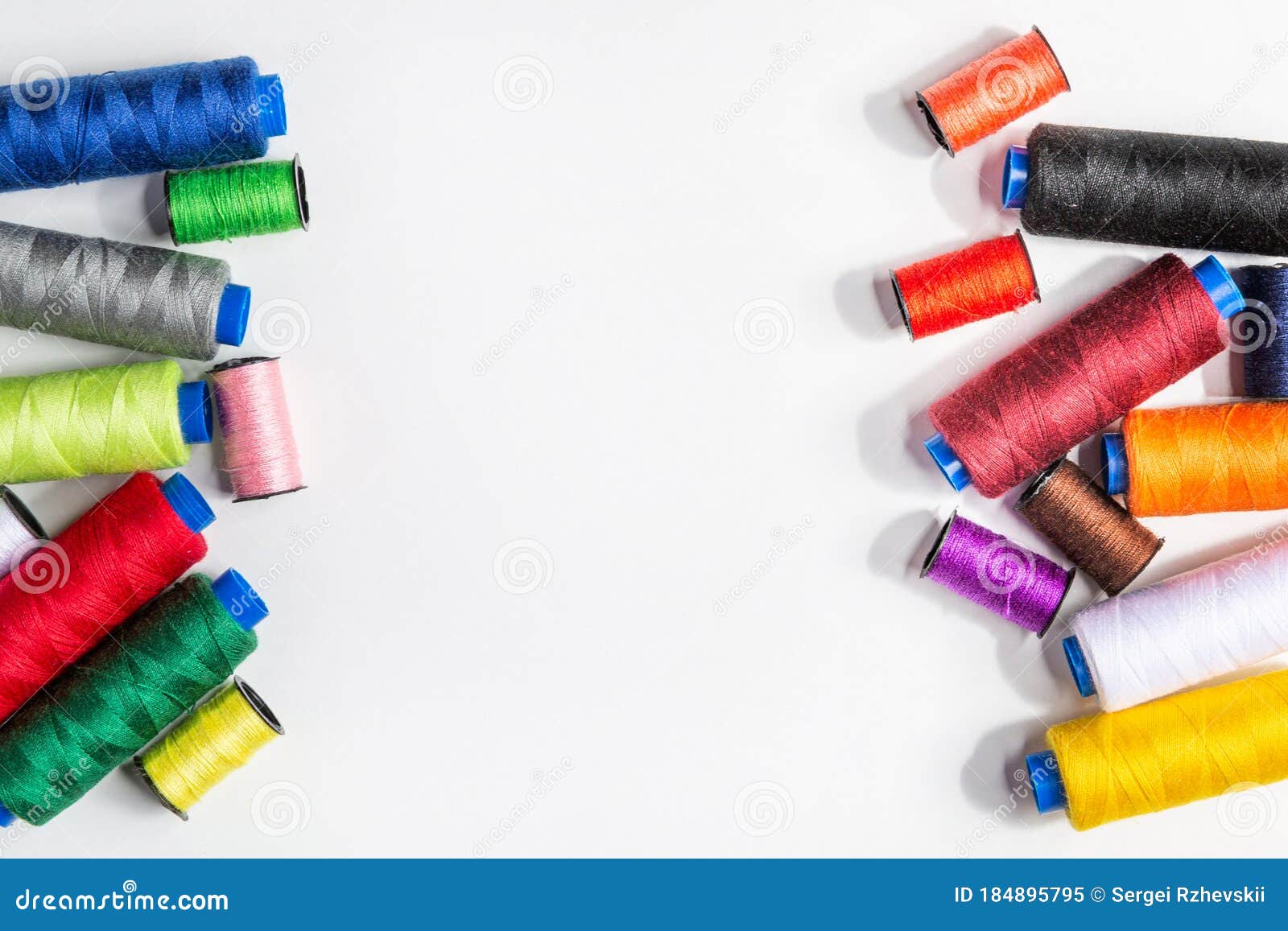 Set of Multi-colored Threads for Sewing on a White Background Stock ...