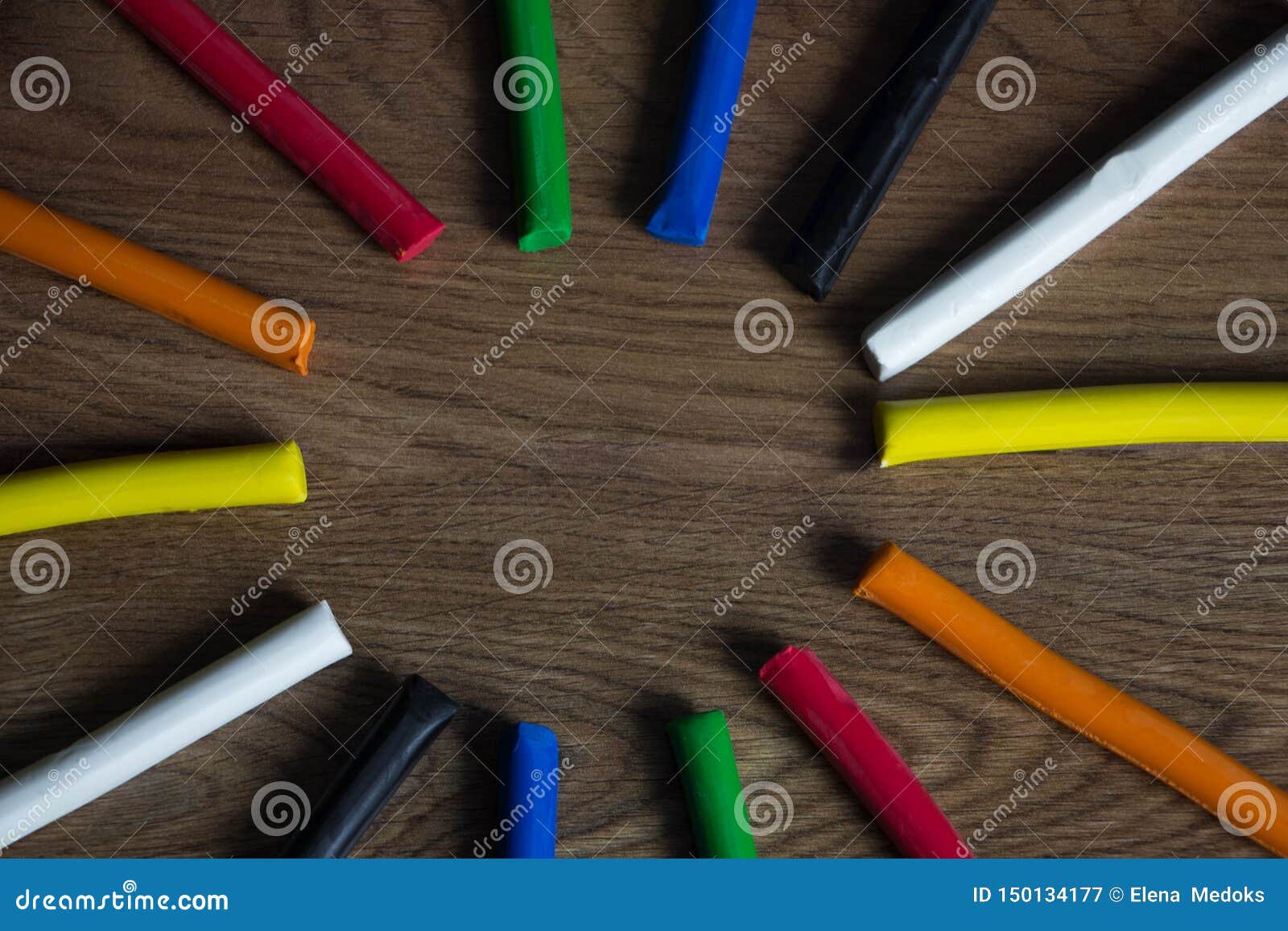 Set of Multicolored Plasticine Bars for Modeling on Wooden Table. Top ...