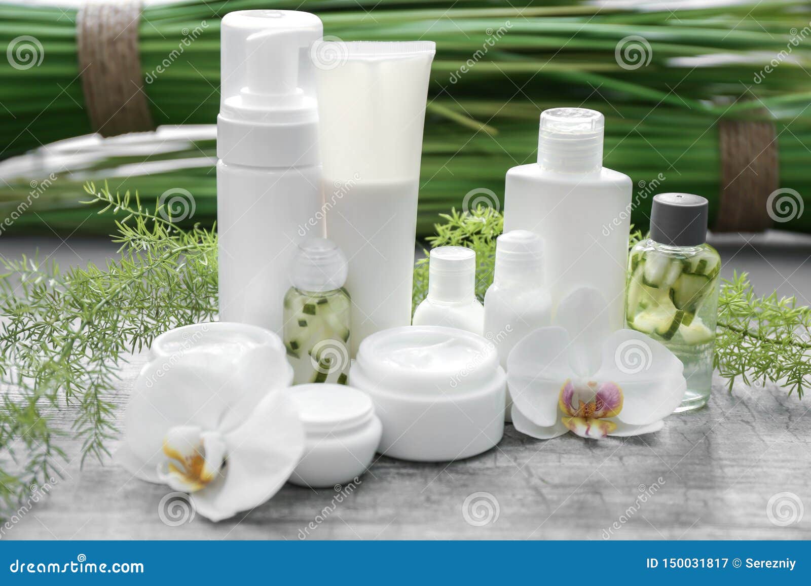 Set of Natural Cosmetics with Herbal Extract on Grey Table Stock Image ...
