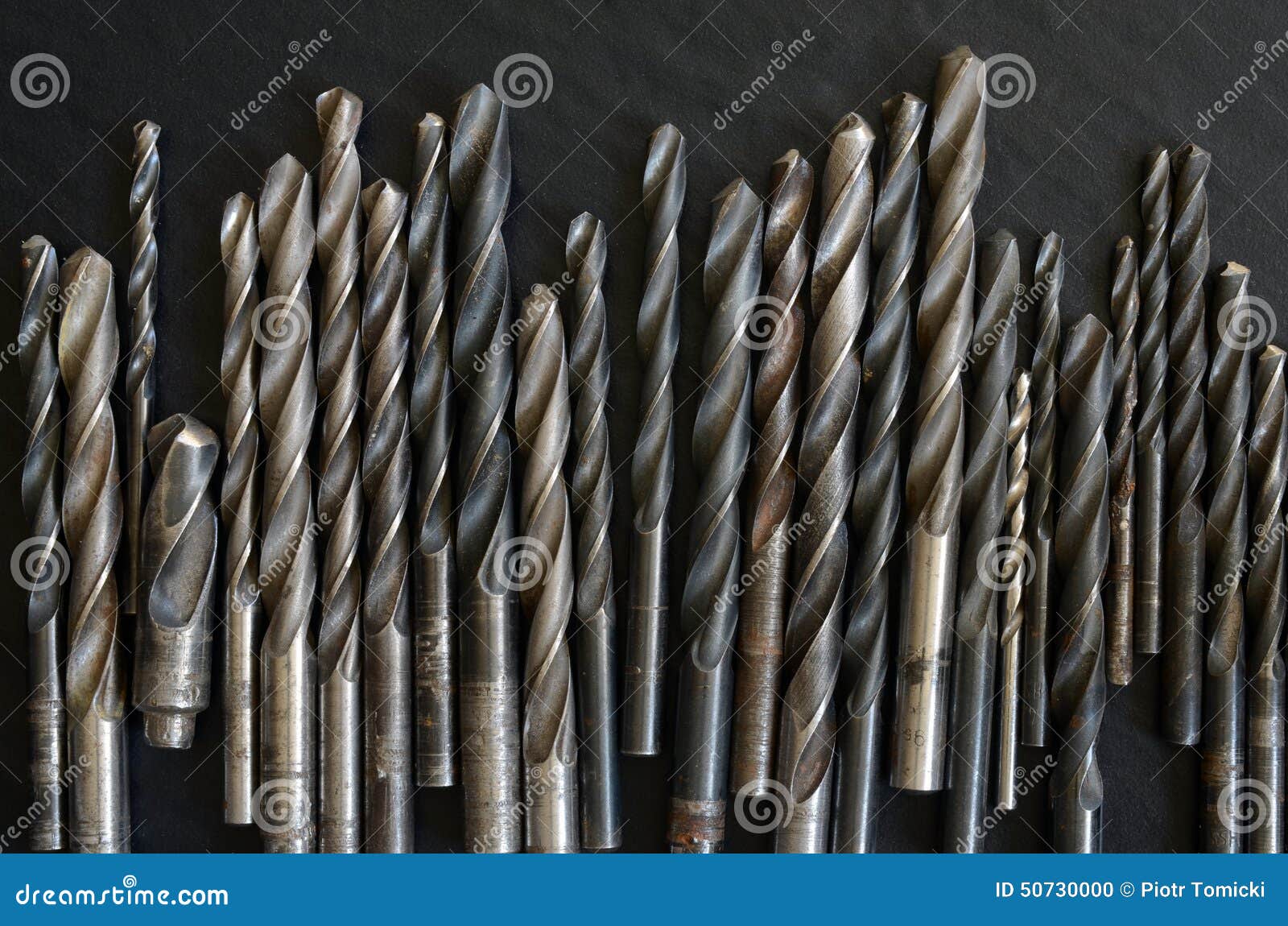 Set of Old Drill Bits on a Dark Table Stock Photo - Image of metal ...