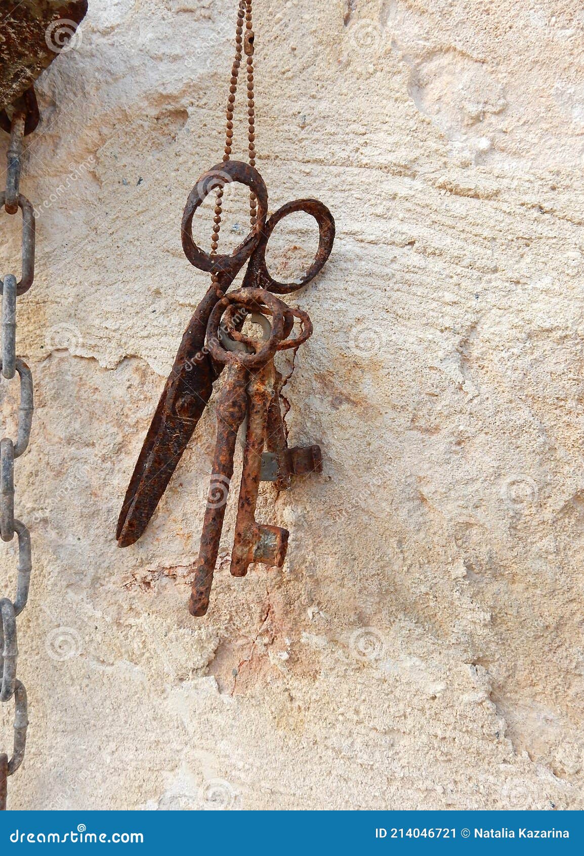 A Set of Old Rusty Items on a Light Background with Scissors, Keys, Etc ...