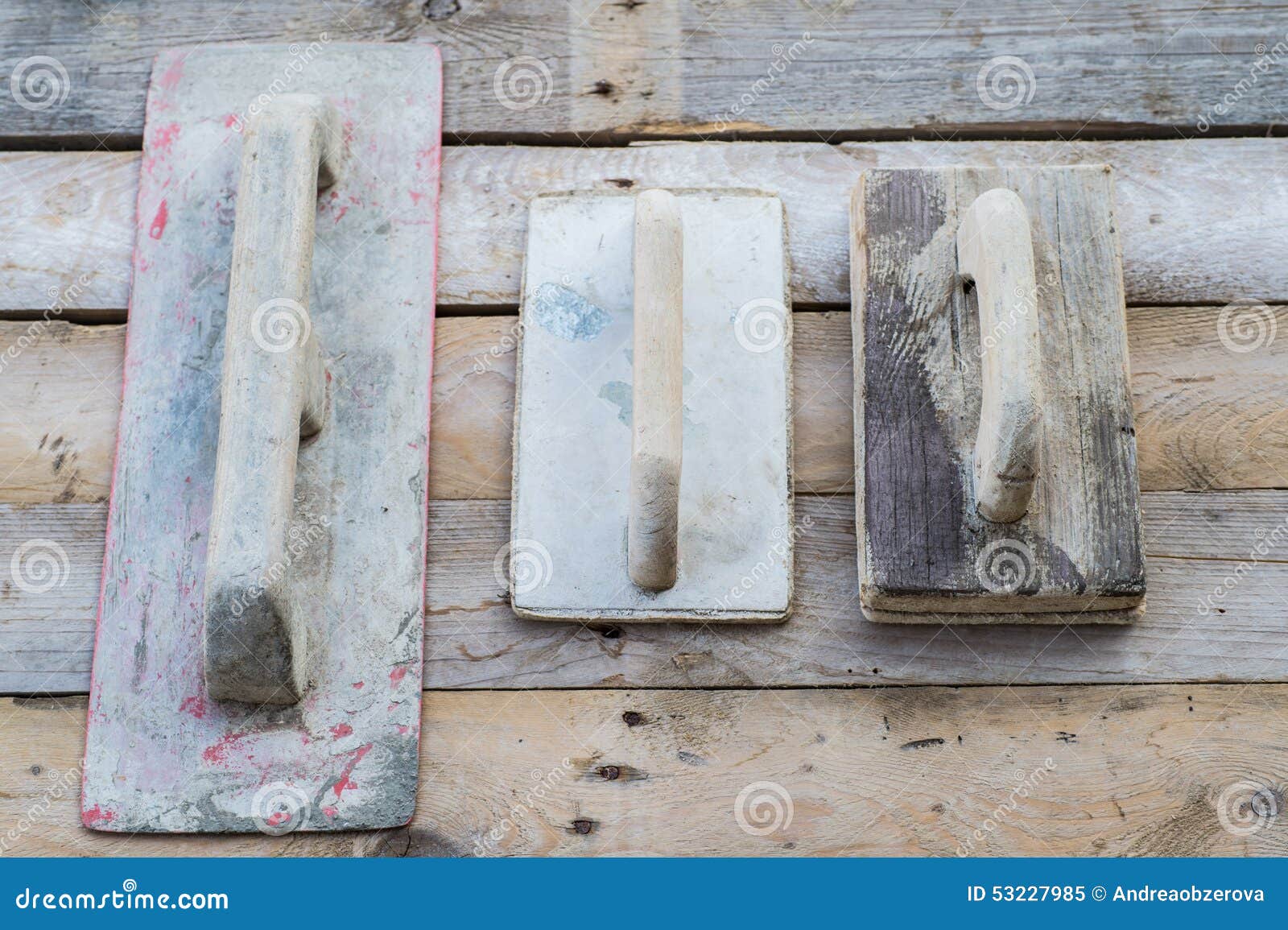Set of Old Used Trowels on a Rough Wooden Surface Stock Image - Image ...