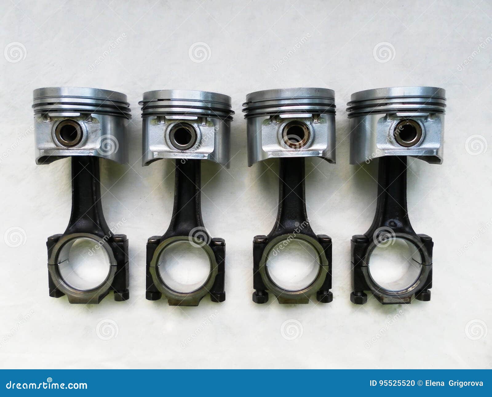 A Set of Pistons and Rods for Automobile Engine on a Background Stock ...