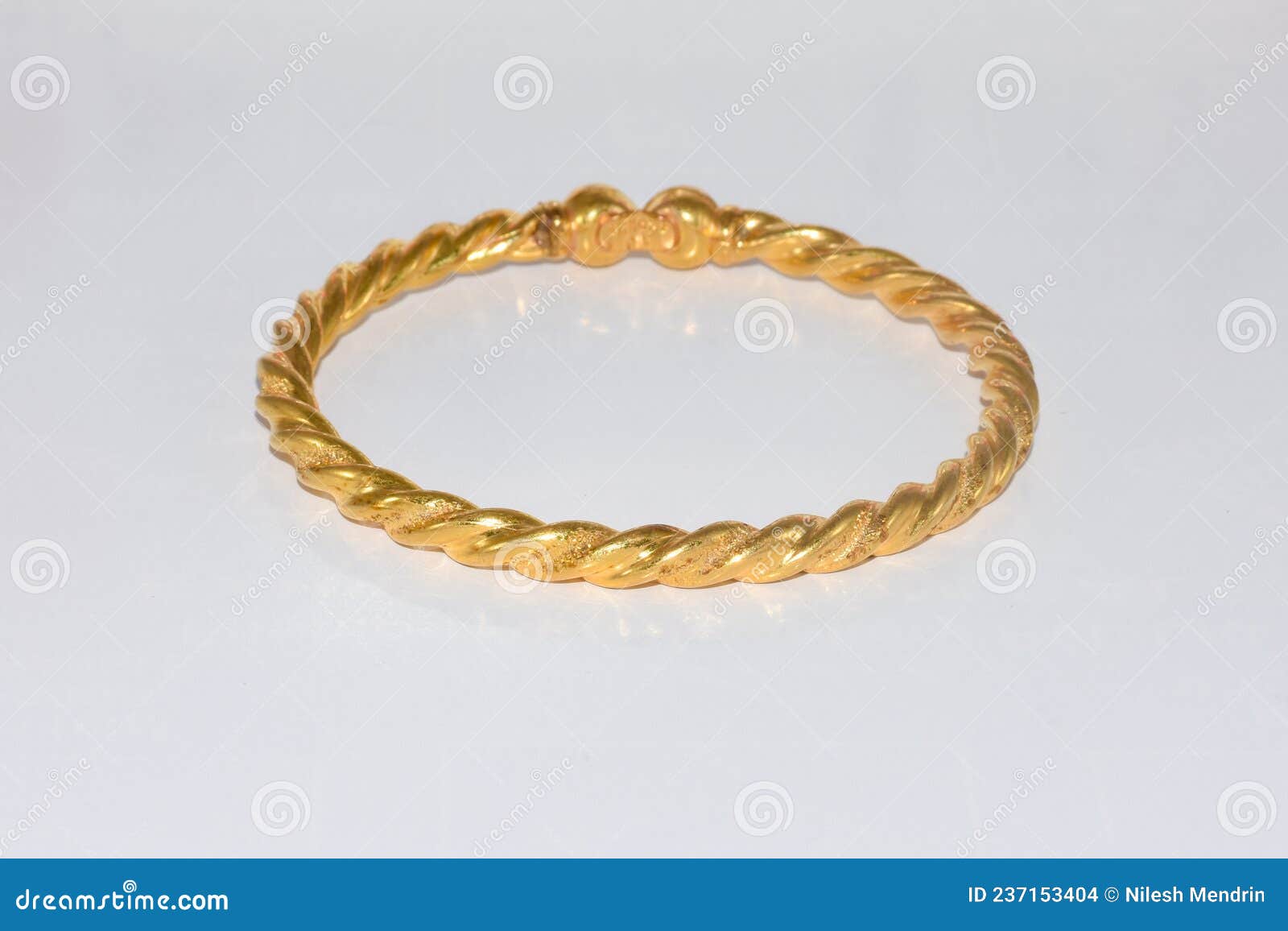 Set of Plain Gold Bangles Designs in White Gold on Background the ...