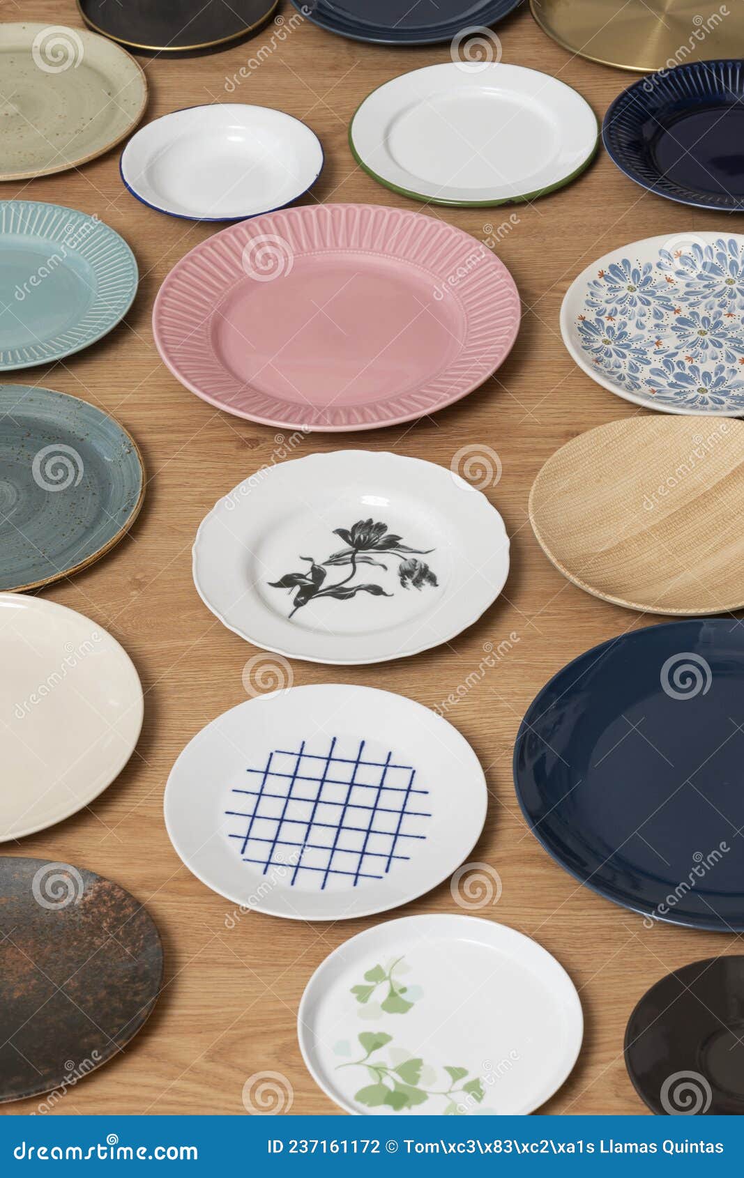 Set of Plates of Different Materials, Styles and Colors Stock Photo ...