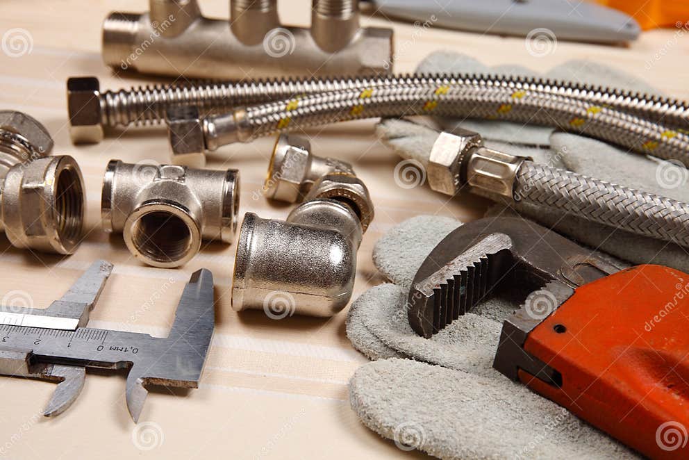 Set of plumbing and tools stock photo. Image of pipes - 57381684