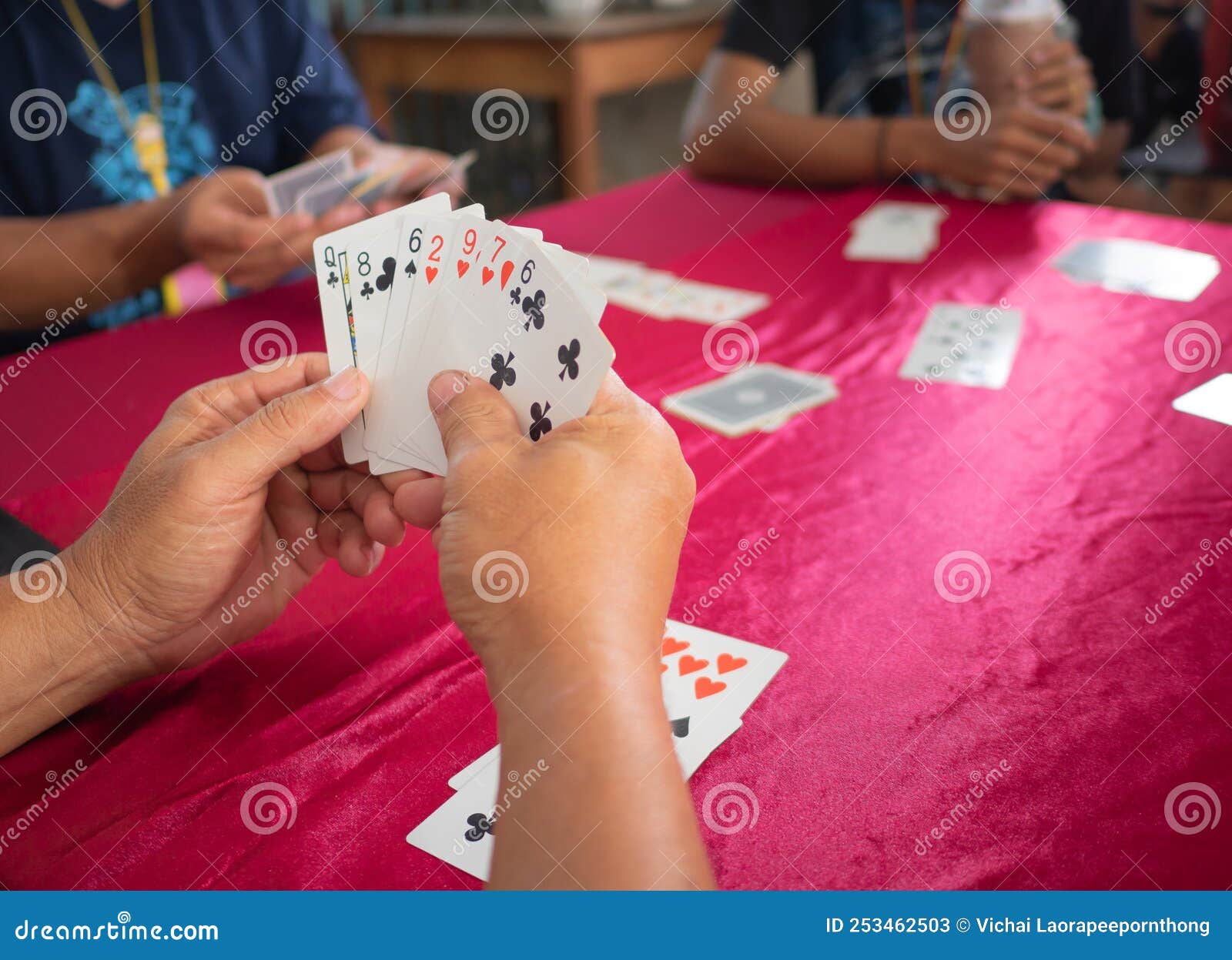 Set of Poker Cards in Hand on the Gambling Table. Stock Image - Image ...