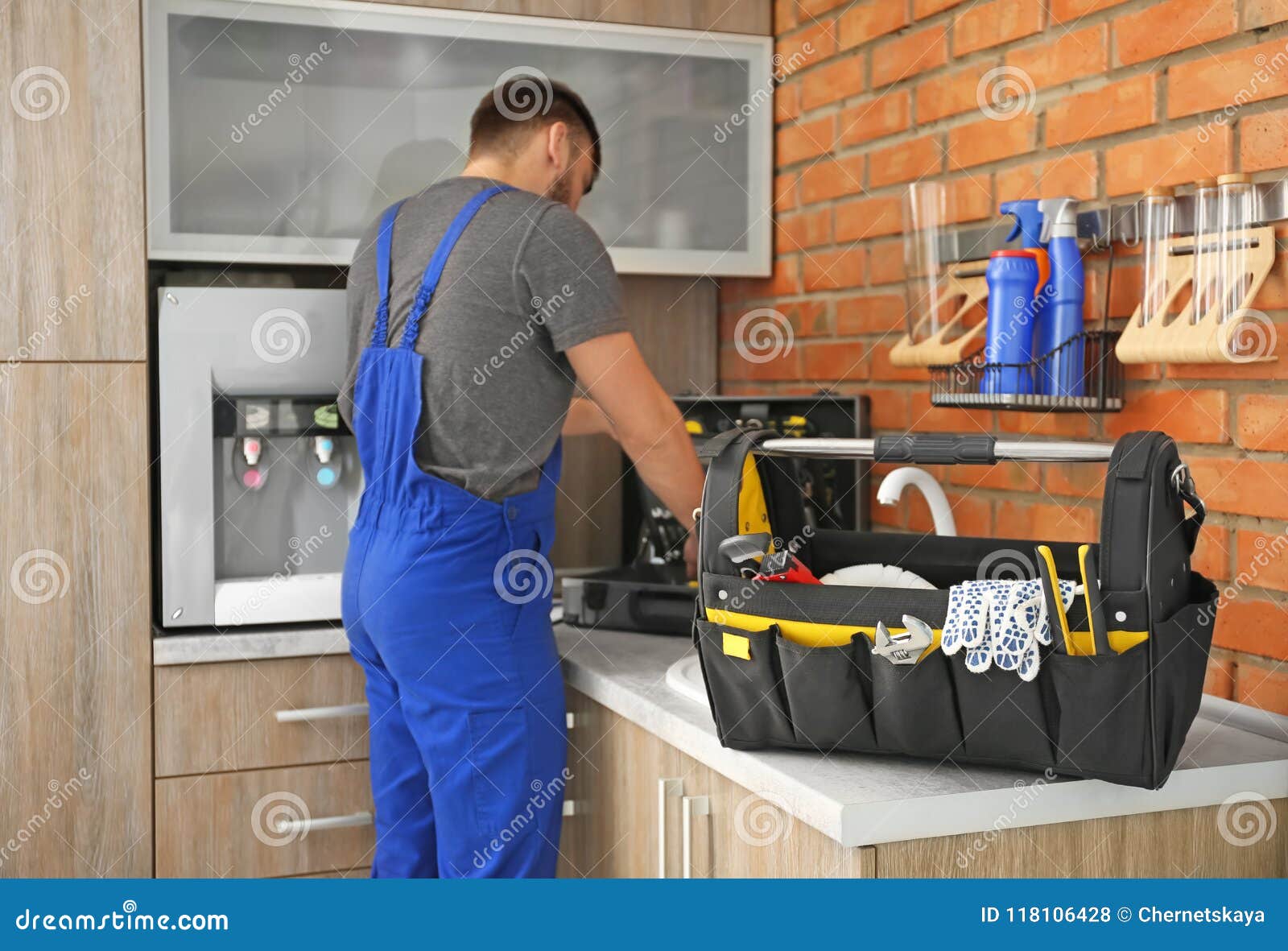 Set of Tools and Plumber in Uniform Indoors Stock Photo - Image of ...