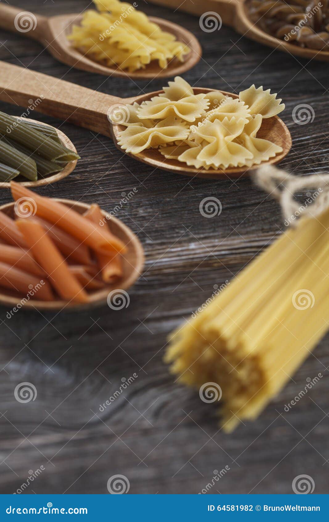 A Set of Raw Pasta on a Wooden Table Stock Photo - Image of closeup ...